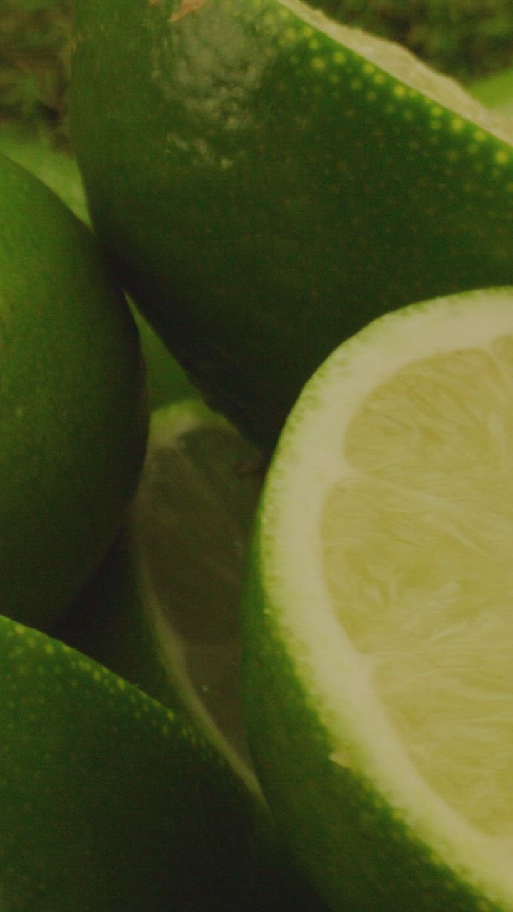 Lemons rotating in a cluster at a leisurely pace - Free Stock Video