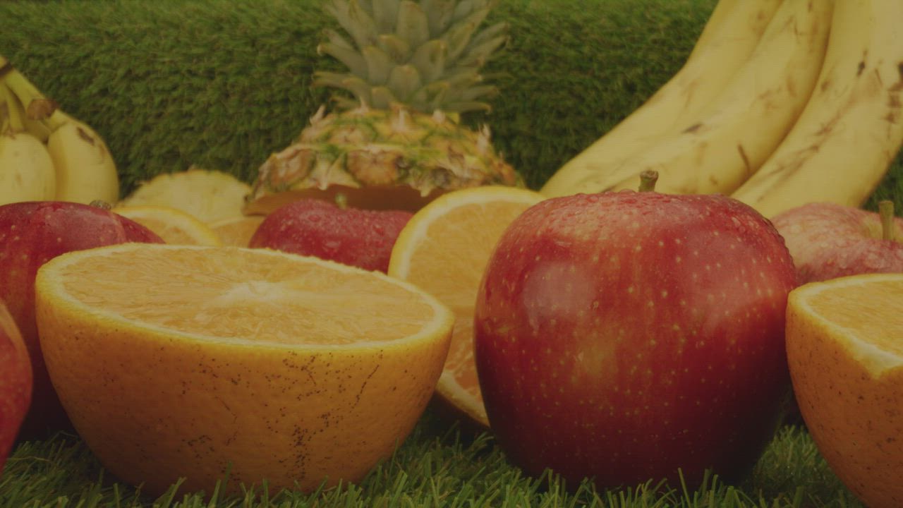 Sliced fresh fruit in a close up shot - Free Stock Video