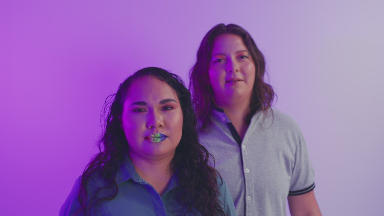 Women displaying LGBTQ pride signs - Free Stock Video