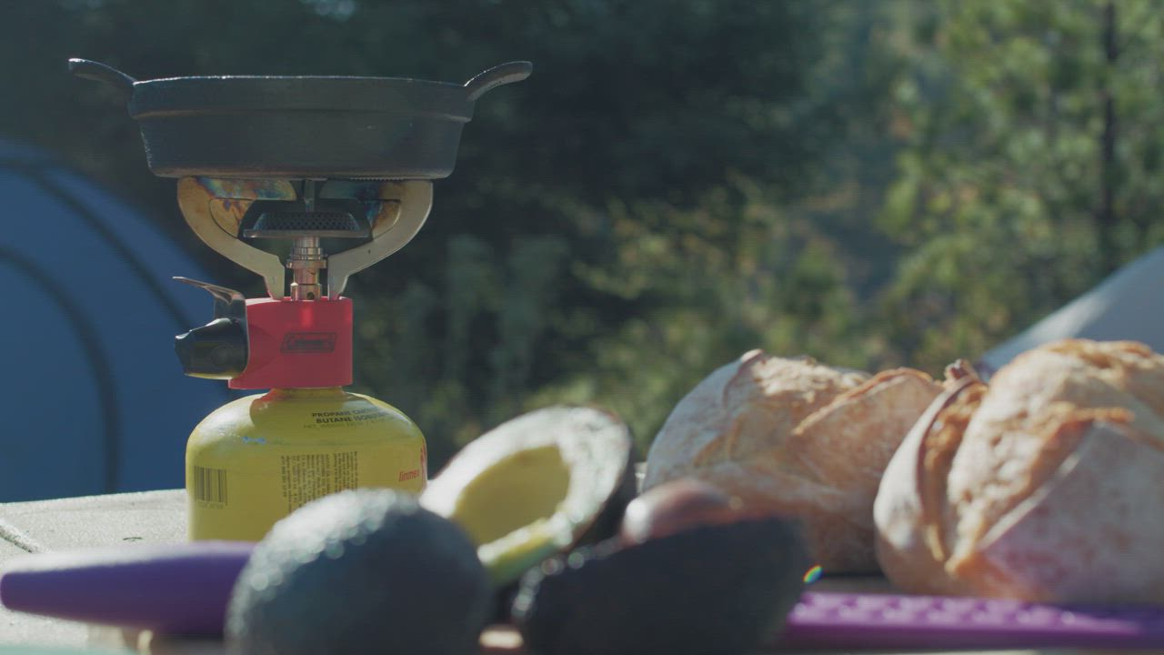 Man cooking at the campsite - Free Stock Video