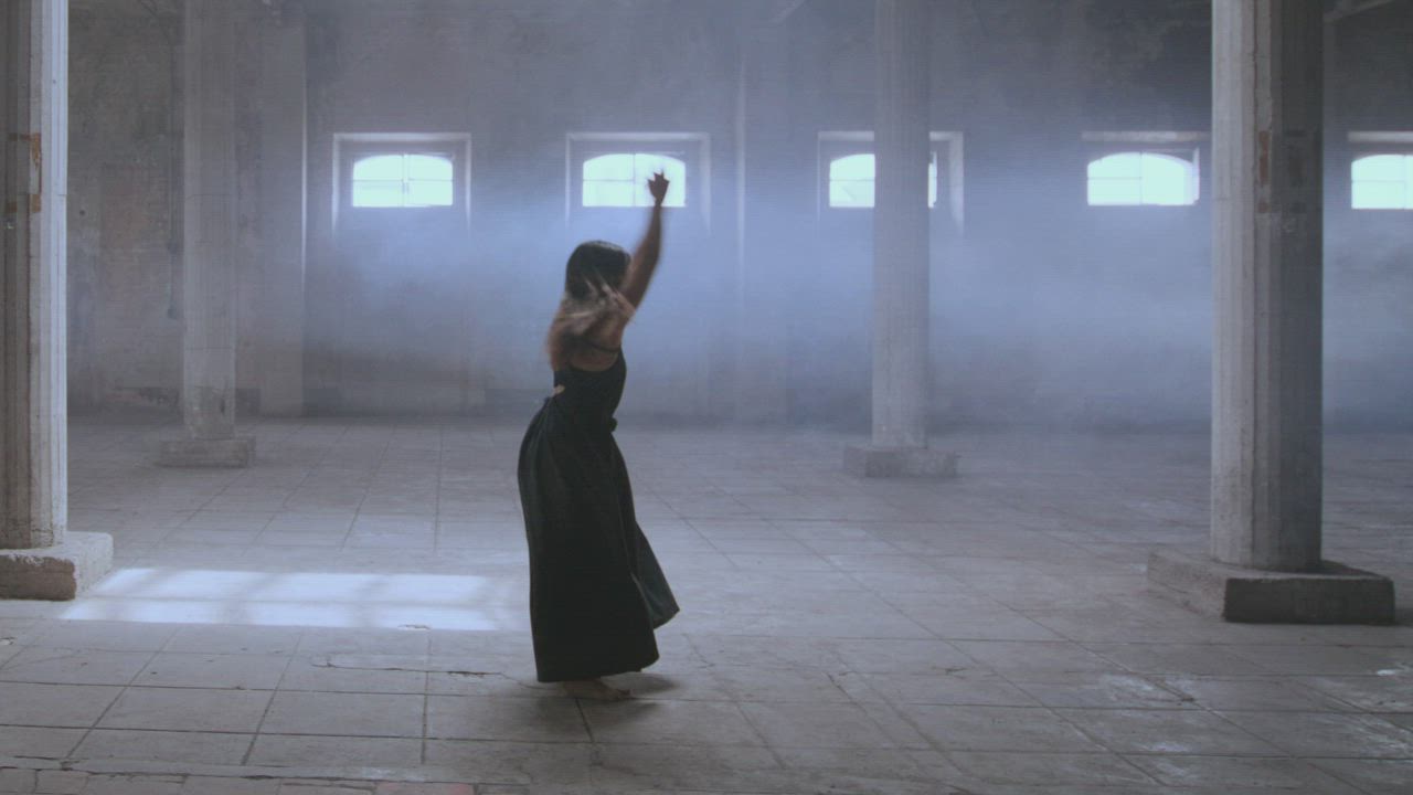 Woman dancing in an old abandoned place - Free Stock Video