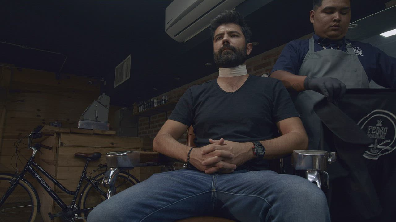 Barber preparing his client - Free Stock Video
