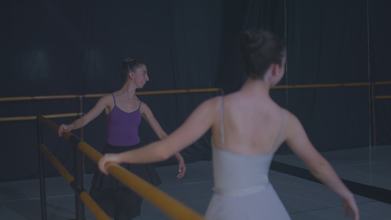 Two experienced ballet dancers practicing - Free Stock Video