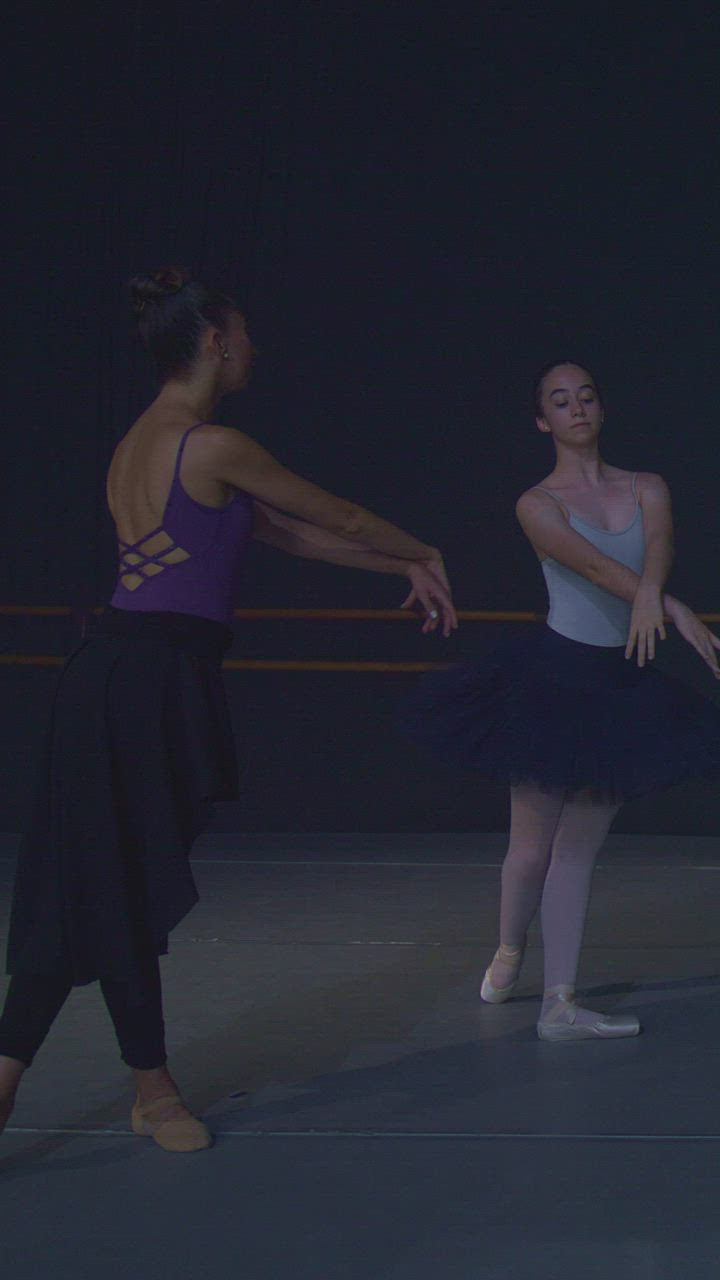 Two ballet dancers practicing movements - Free Stock Video