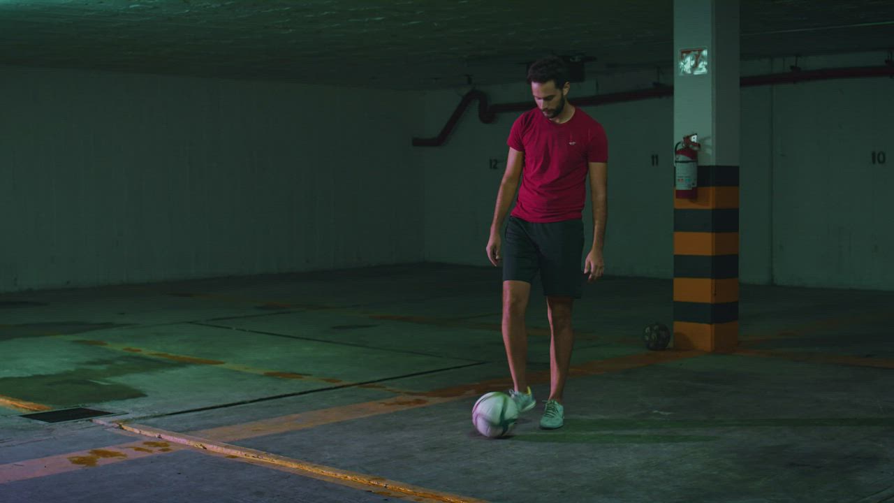 Soccer player doing complicated juggling with the ball - Free Stock Video