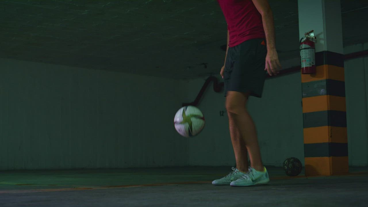 Skillful ball juggling from a skilled freestyler - Free Stock Video