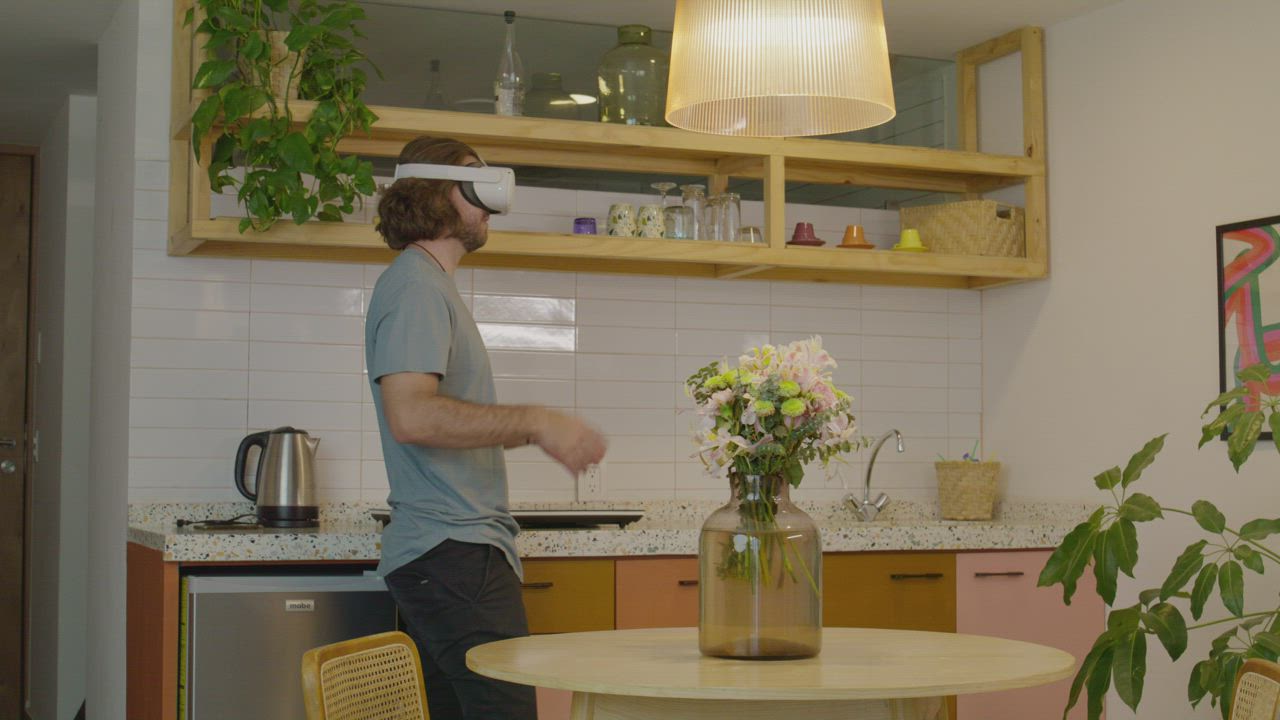 Man using virtual reality glasses at home - Free Stock Video