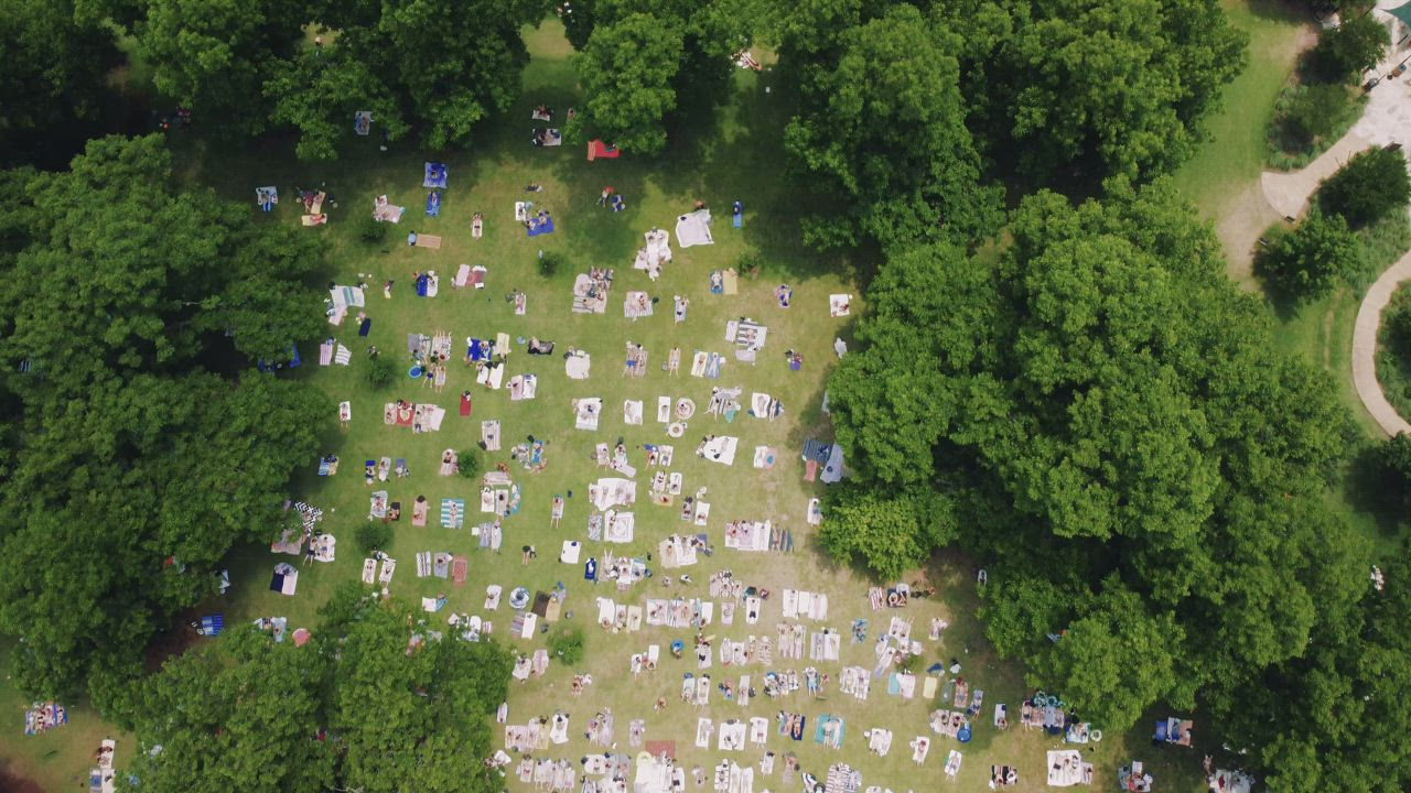 View from above to a park near a river - Free Stock Video