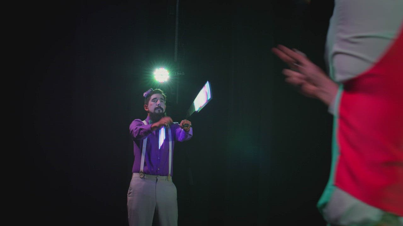 Two jugglers performing on a stage - Free Stock Video