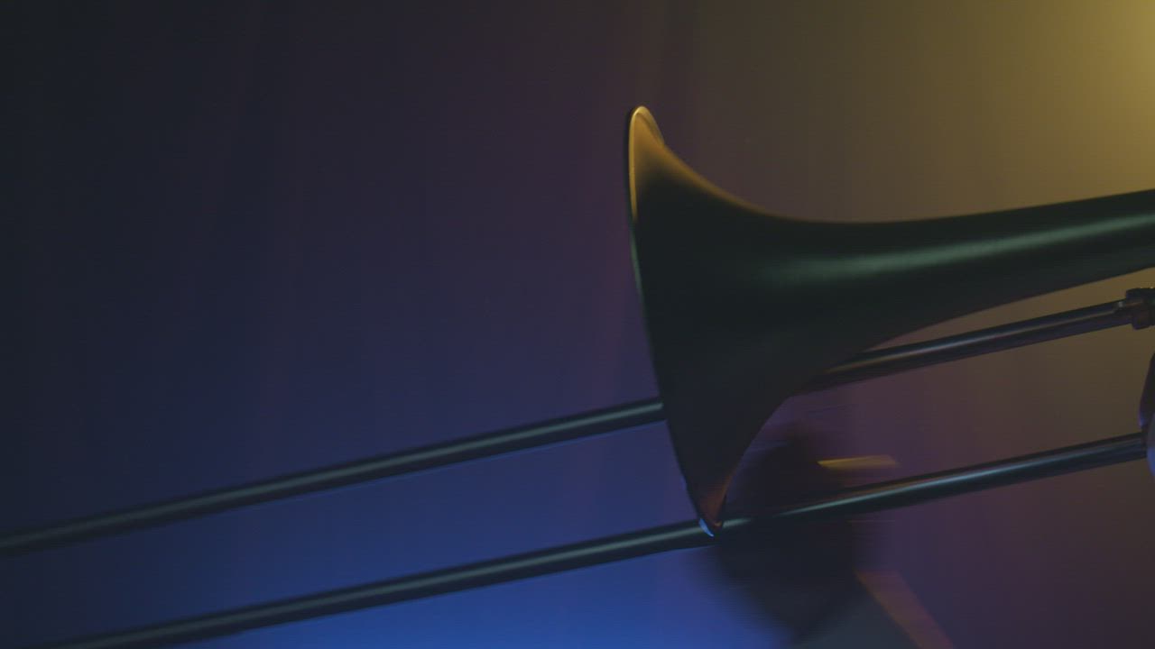 Portrait of a trumpeter playing - Free Stock Video