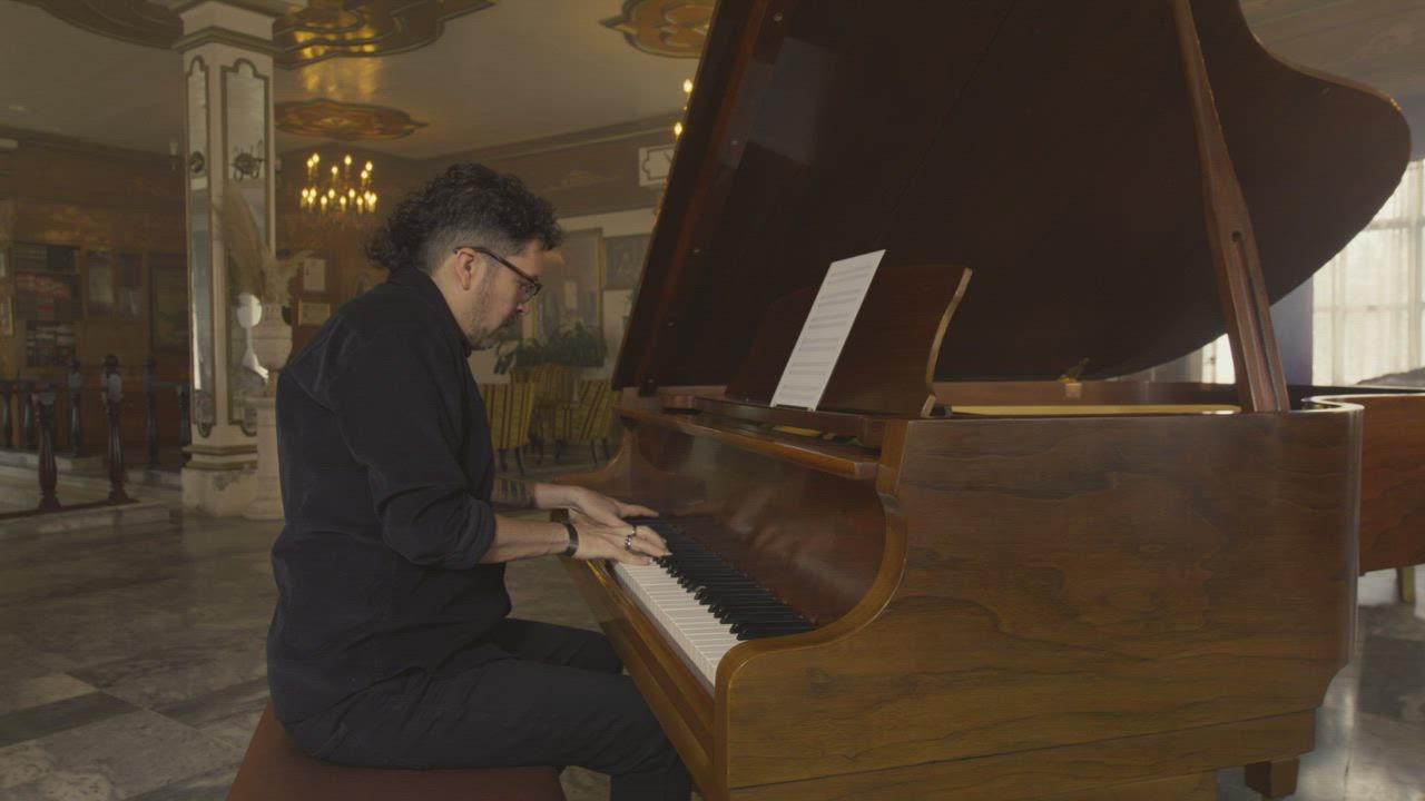 Virtuous pianist playing in an elegant venue - Free Stock Video