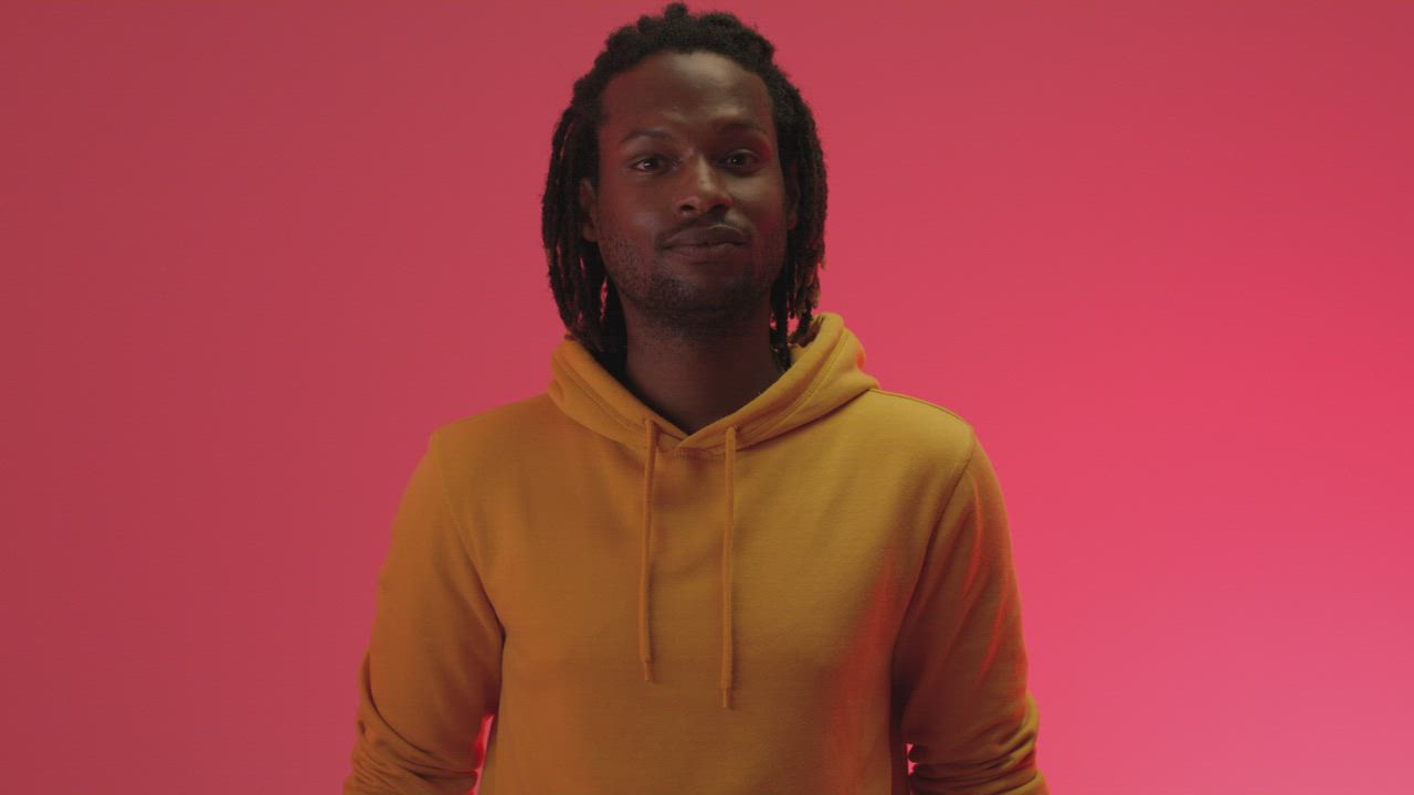 Front facing man winking towards the lens - Free Stock Video