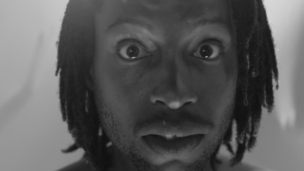 Face of a vulnerable and fearful man - Free Stock Video