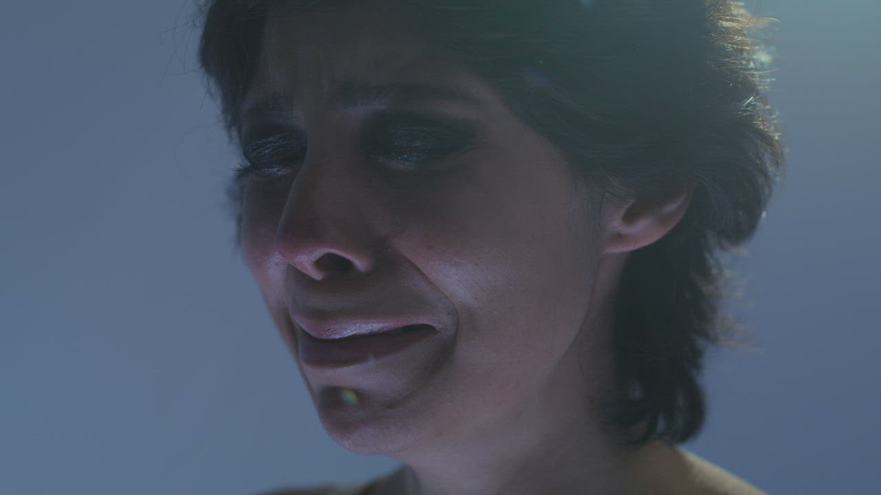 Face of a very sad woman crying - Free Stock Video