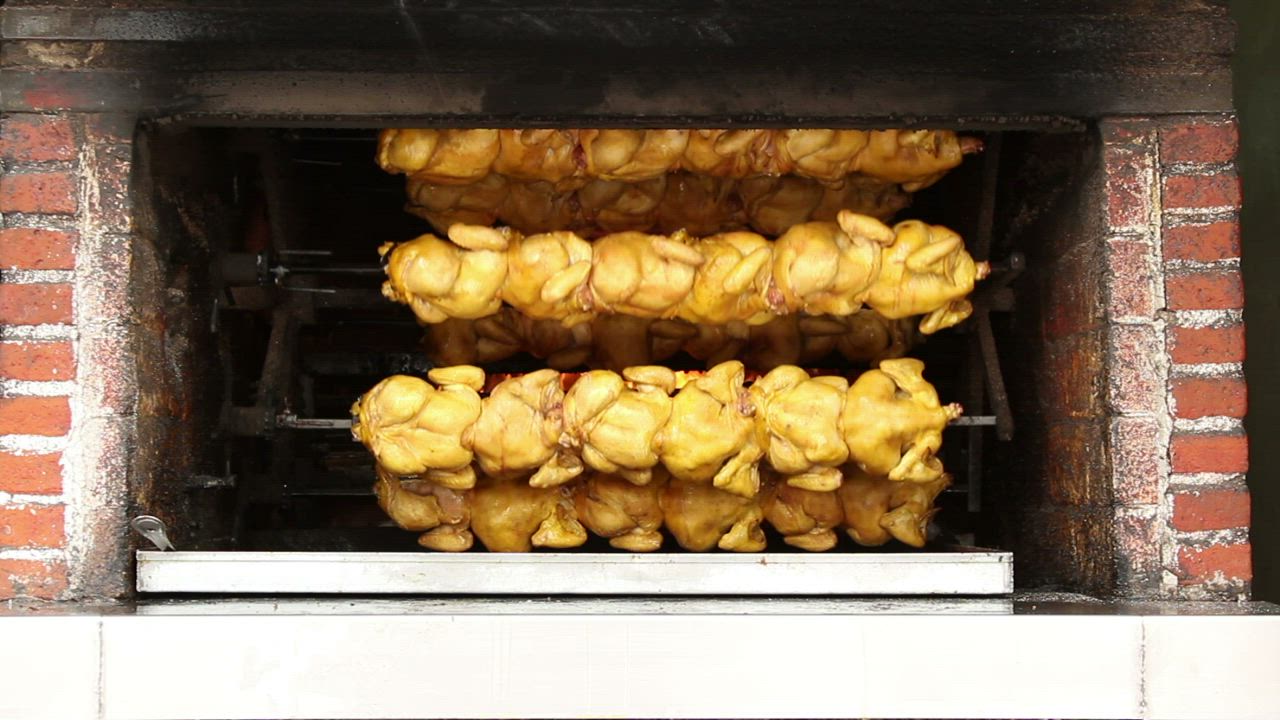Rotary brick chicken oven - Free Stock Video