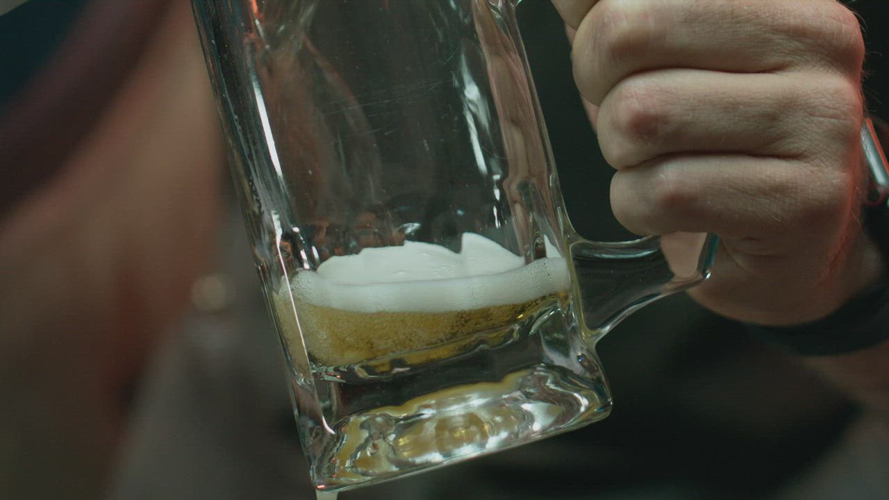 Pouring beer in a mug - Free Stock Video
