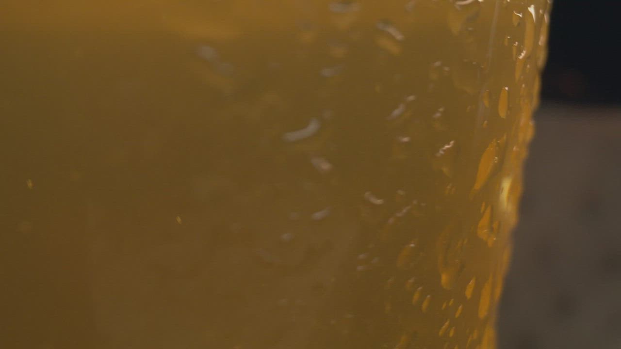 Texture of a glass with cold beer - Free Stock Video