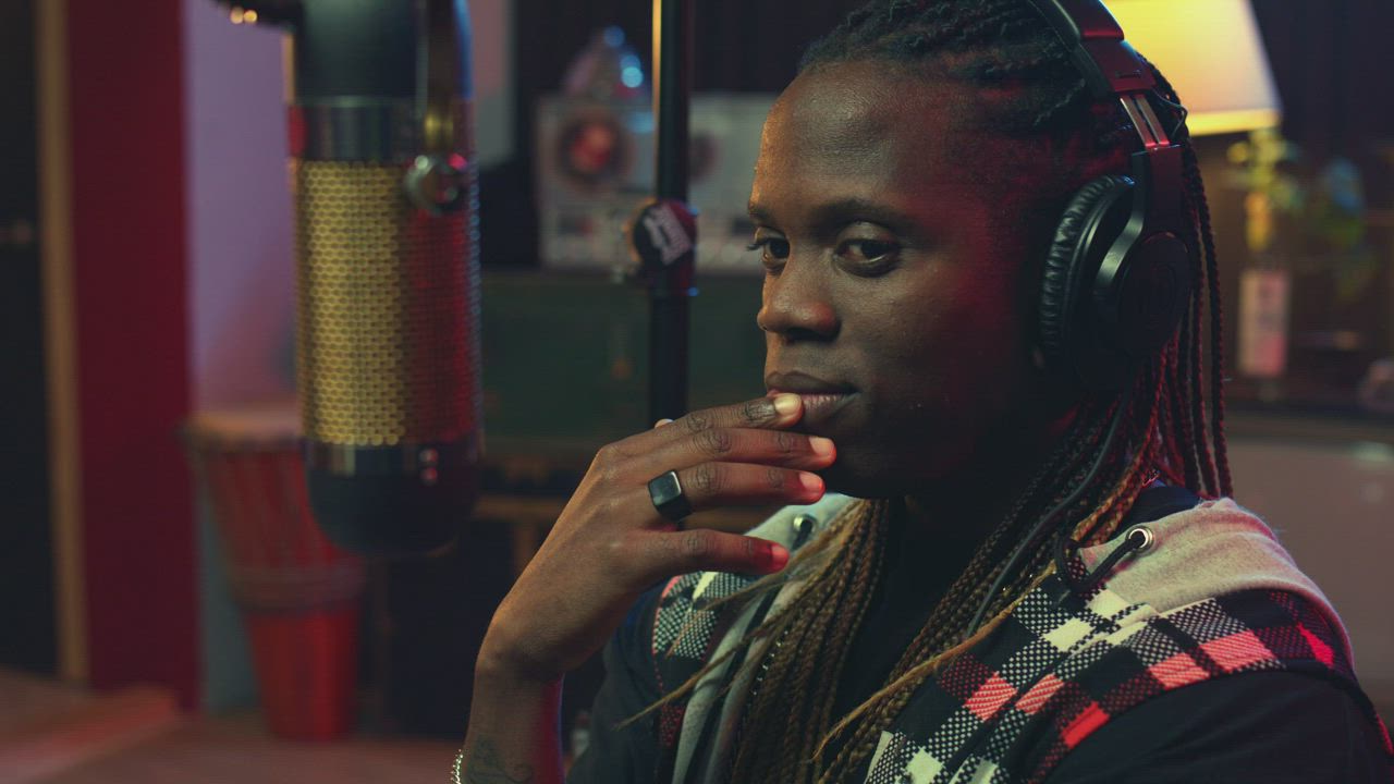 Portrait of a man speaking on a podcast - Free Stock Video