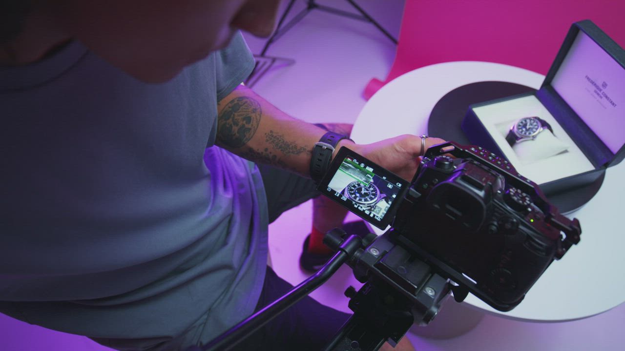 Young man making a video of a watch - Free Stock Video