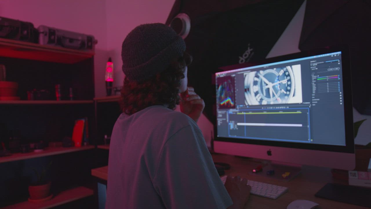 Boy editing a video on a computer - Free Stock Video