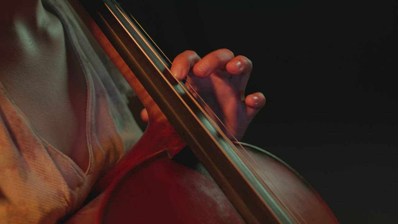 Close up shot of a female cellist playing - Free Stock Video