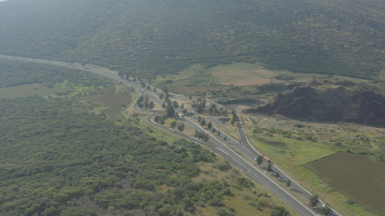 Aerial panorama around a highway - Free Stock Video