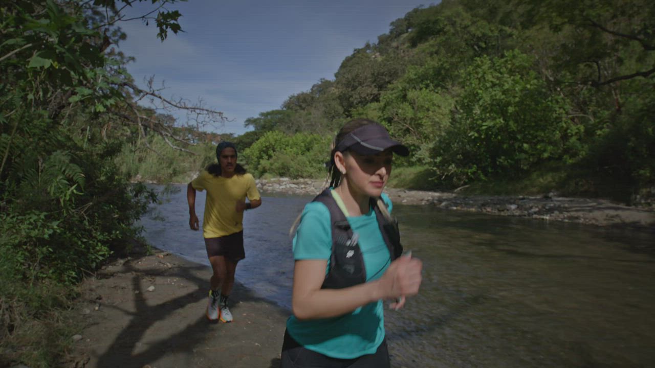Two people jogging outdoors in nature - Free Stock Video