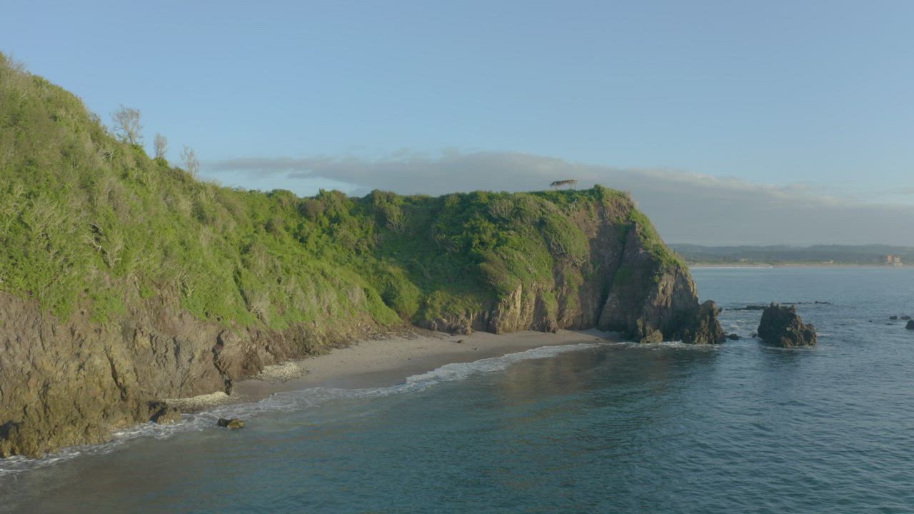 Aerial view of a small peninsula - Free Stock Video