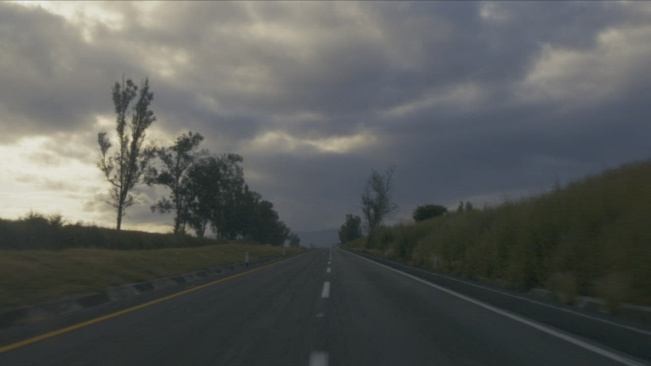 Point of view driving across a road - Free Stock Video