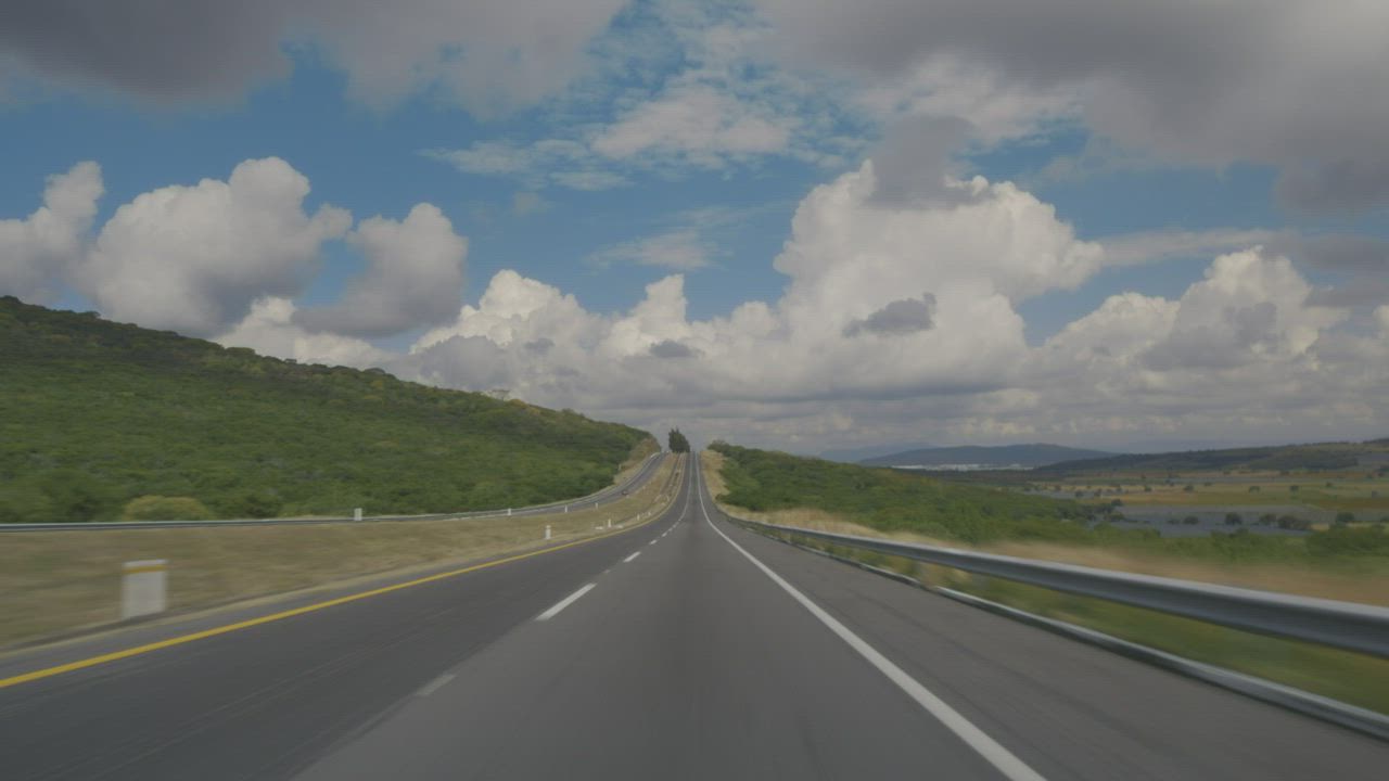 Speeding down a highway in a point of view shot - Free Stock Video