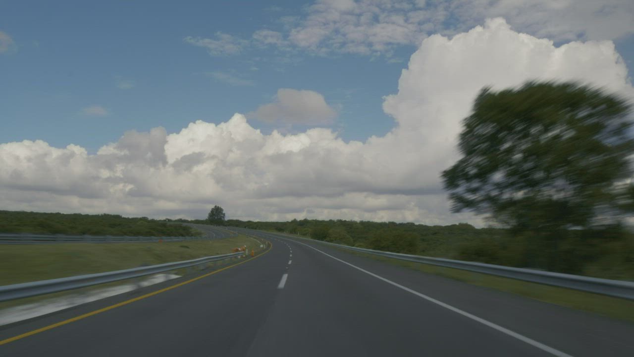 Point of view in a car traveling on the highway - Free Stock Video