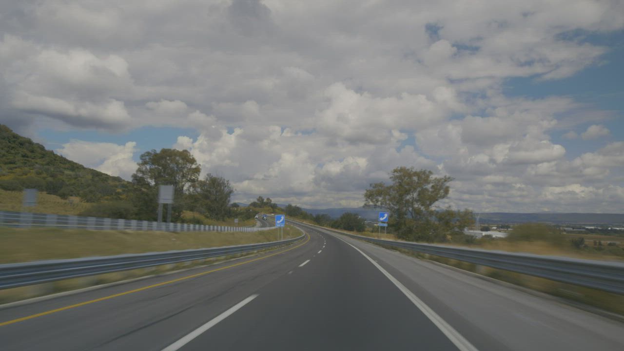 Traveling fast on a highway, point of view - Free Stock Video