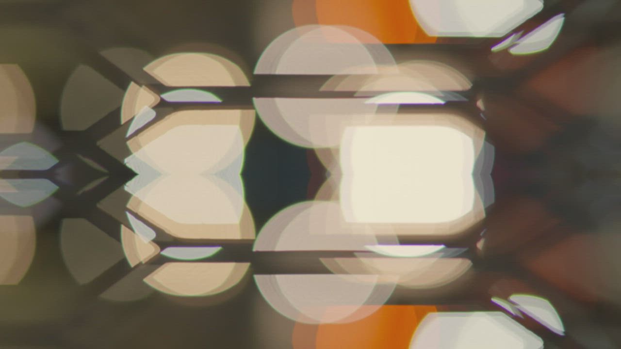 Video with mirrors in symmetry of defocused lights - Free Stock Video