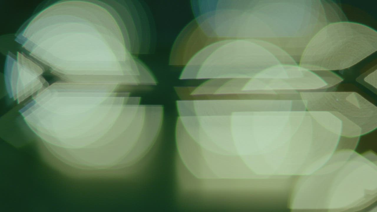 Moving lights in an out-of-focus video - Free Stock Video