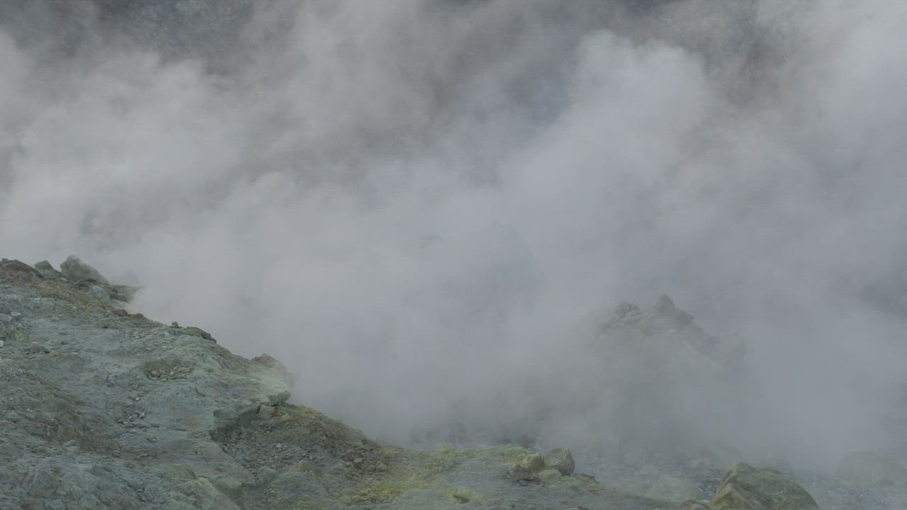 Smoke coming out of a volcano - Free Stock Video