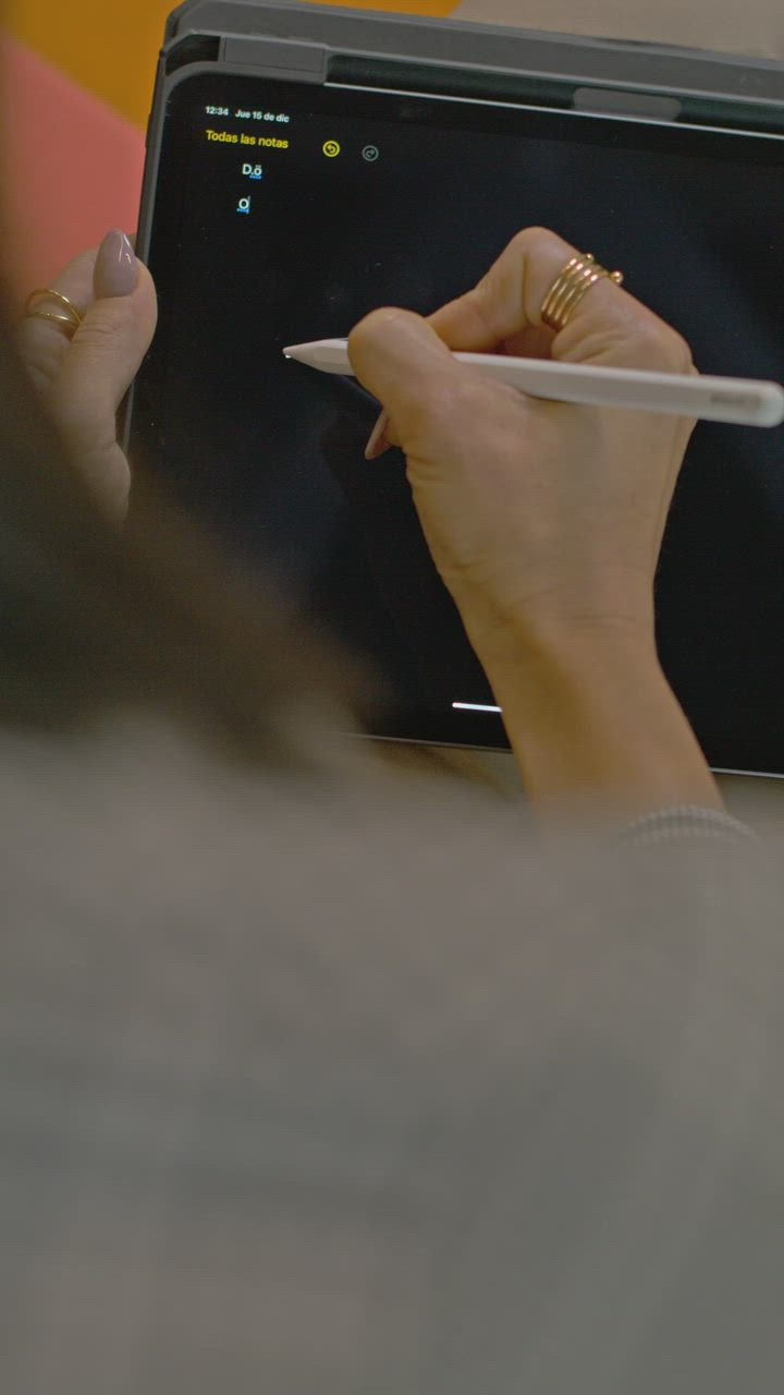 Young woman drawing on a tablet with a stylus - Free Stock Video