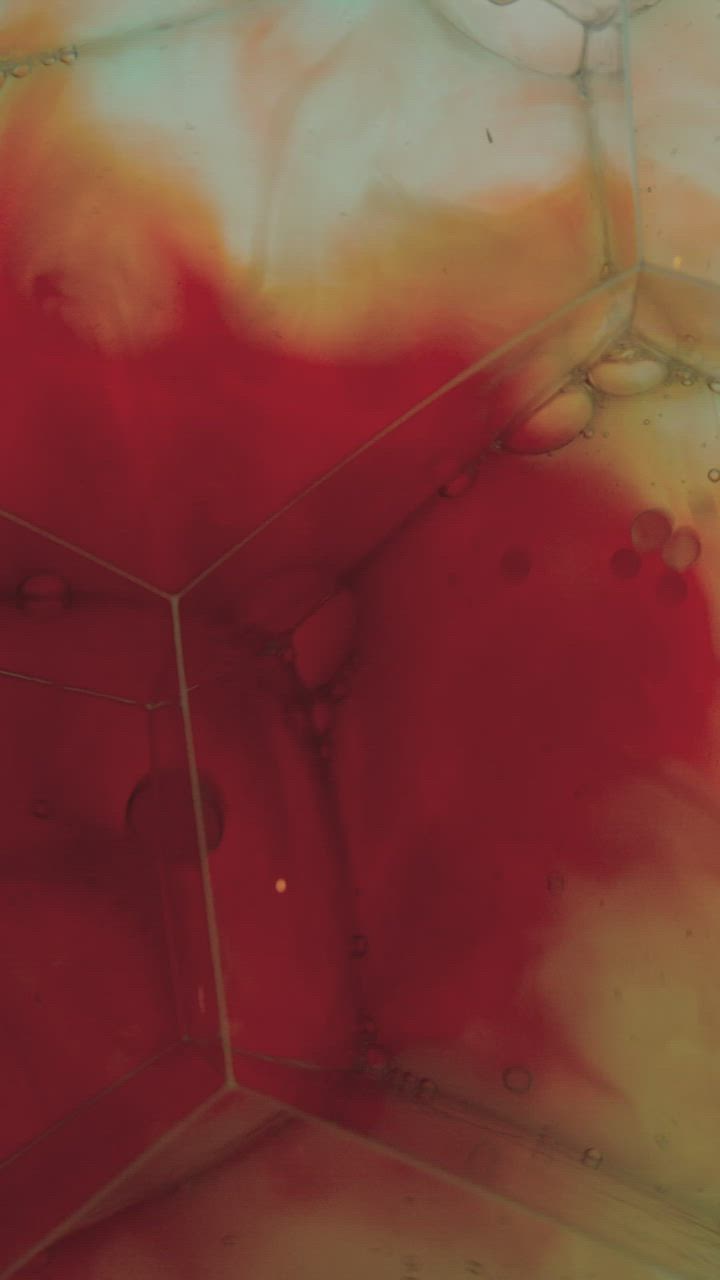 Texture of a liquid bubble with colored inks - Free Stock Video