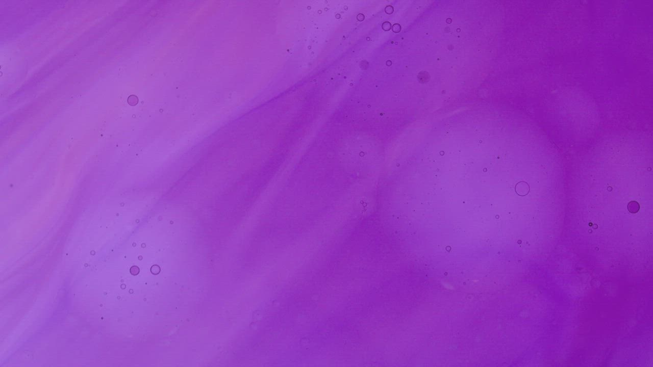 Texture of a thick purple liquid slowly flowing - Free Stock Video