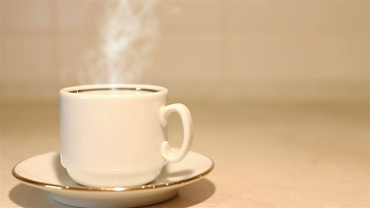 Steaming hot cup of fresh coffee in a ceramic, gold trimmed mug - Free ...