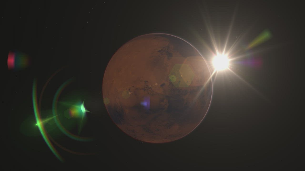 Mars rotating slowly around the Sun in Space - Free Stock Video
