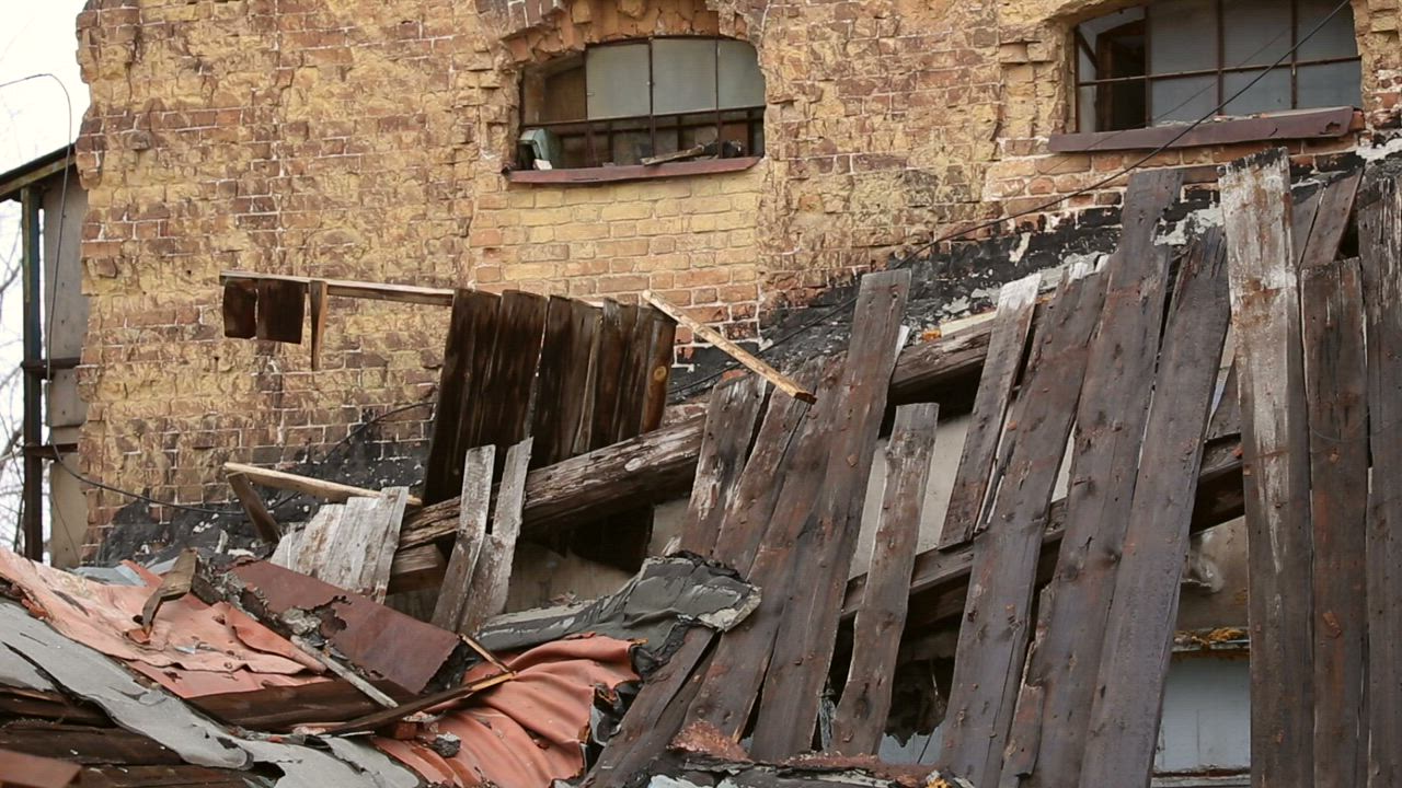 An abandoned and run down brick building - Free Stock Video