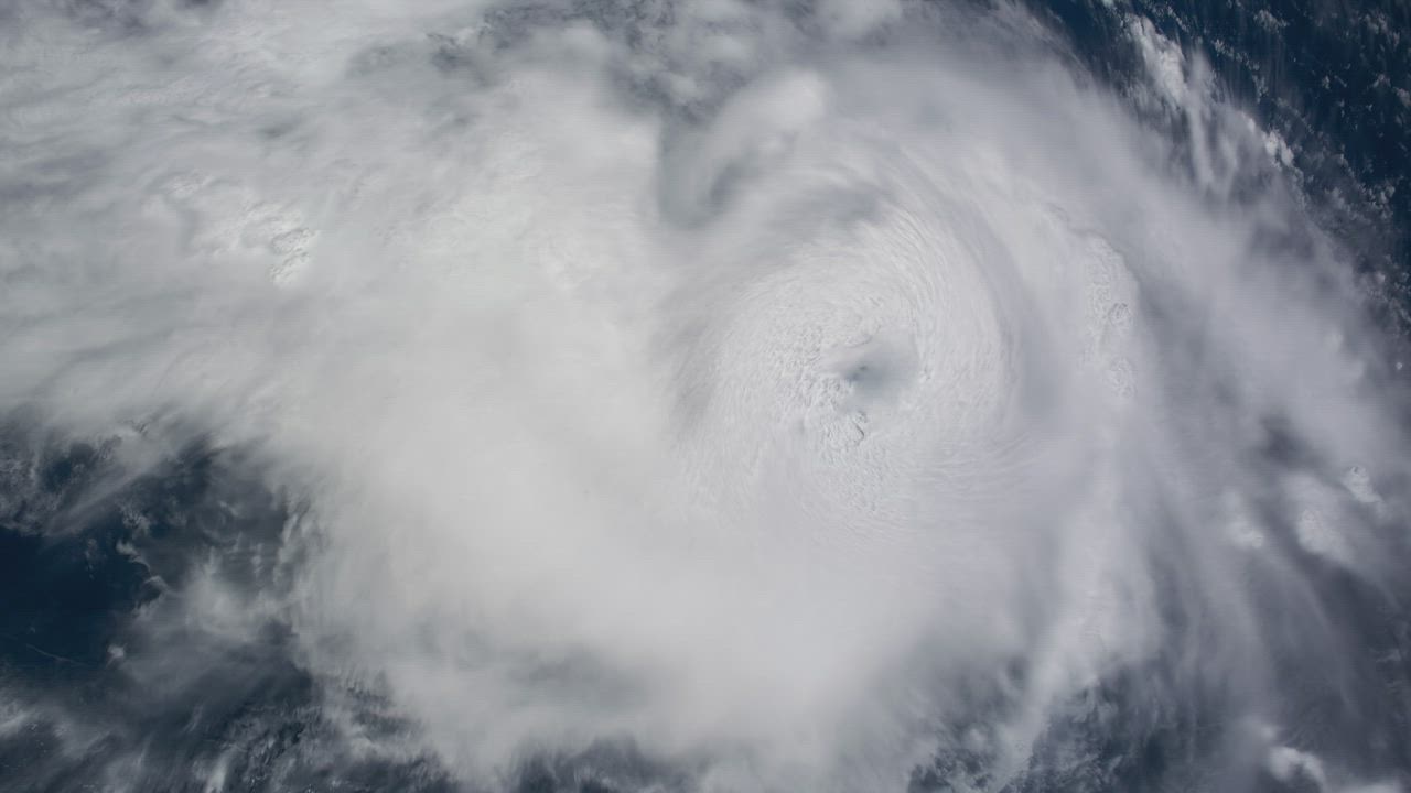 Satellite view of a large tropical cyclone forming - Free Stock Video