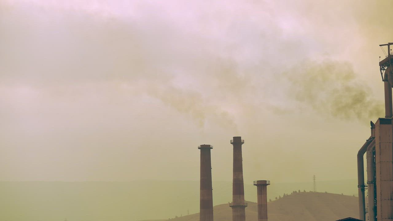 Smoking chimneys of factories - Free Stock Video