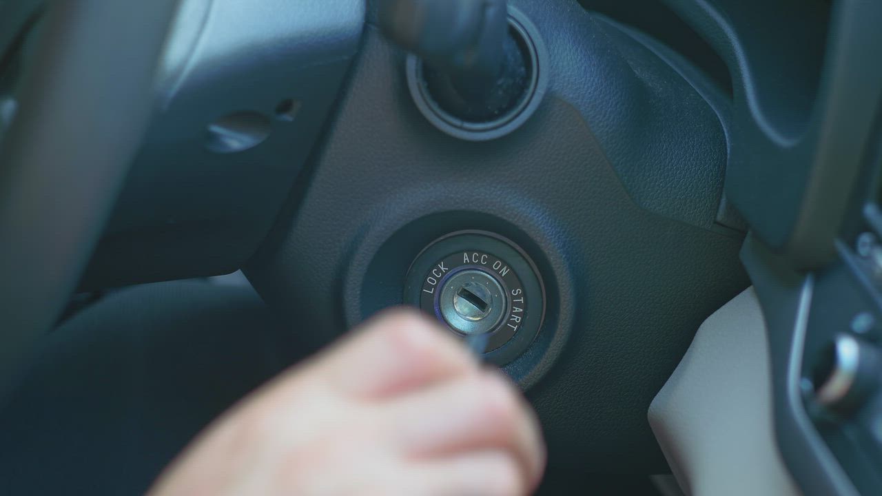 Close up of a car key ignition - Free Stock Video