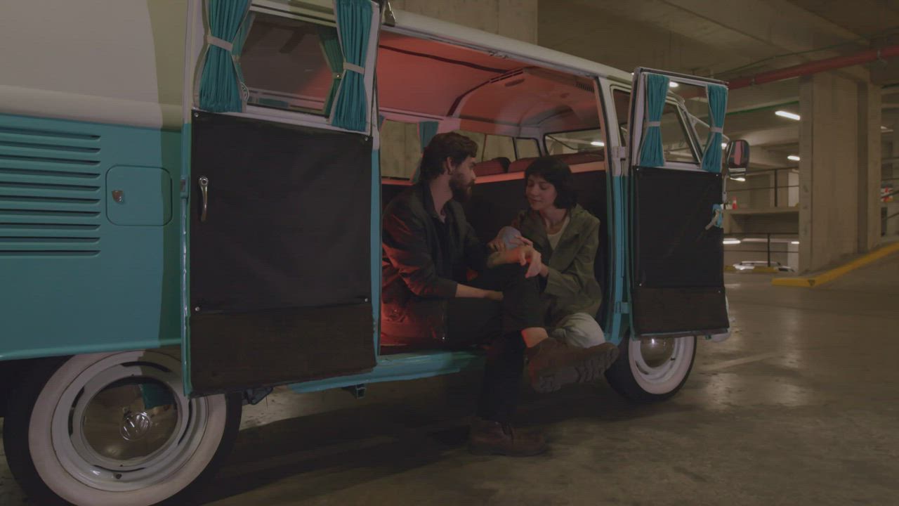 Romantic date in a van in a parking lot - Free Stock Video