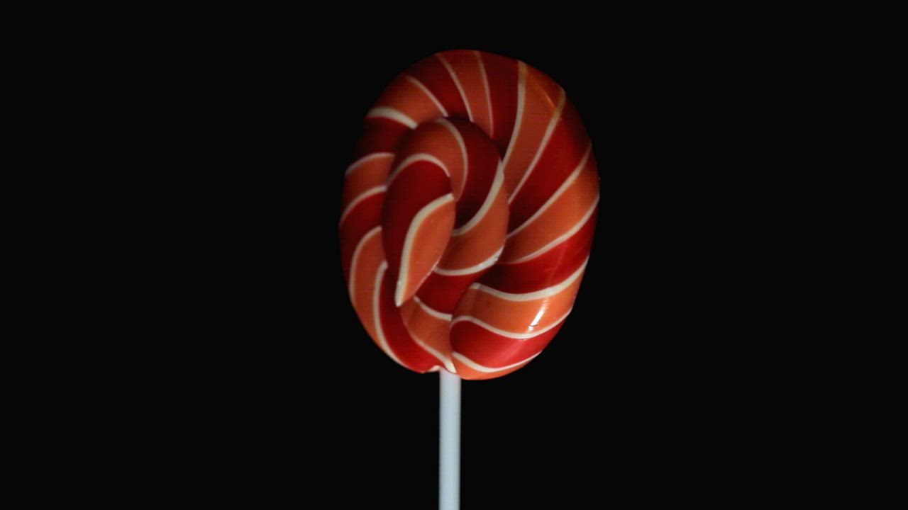 Yummy spiral lollipop spinning - Free Stock Video