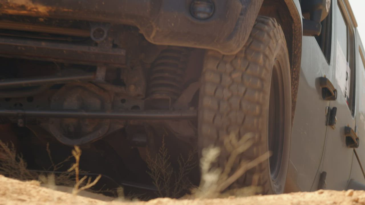 Big SUV going off road in a Safari in Africa - Free Stock Video