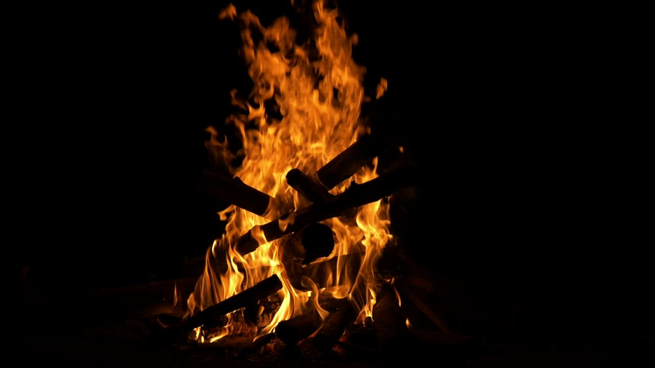 Fire of a bonfire against black - Free Stock Video