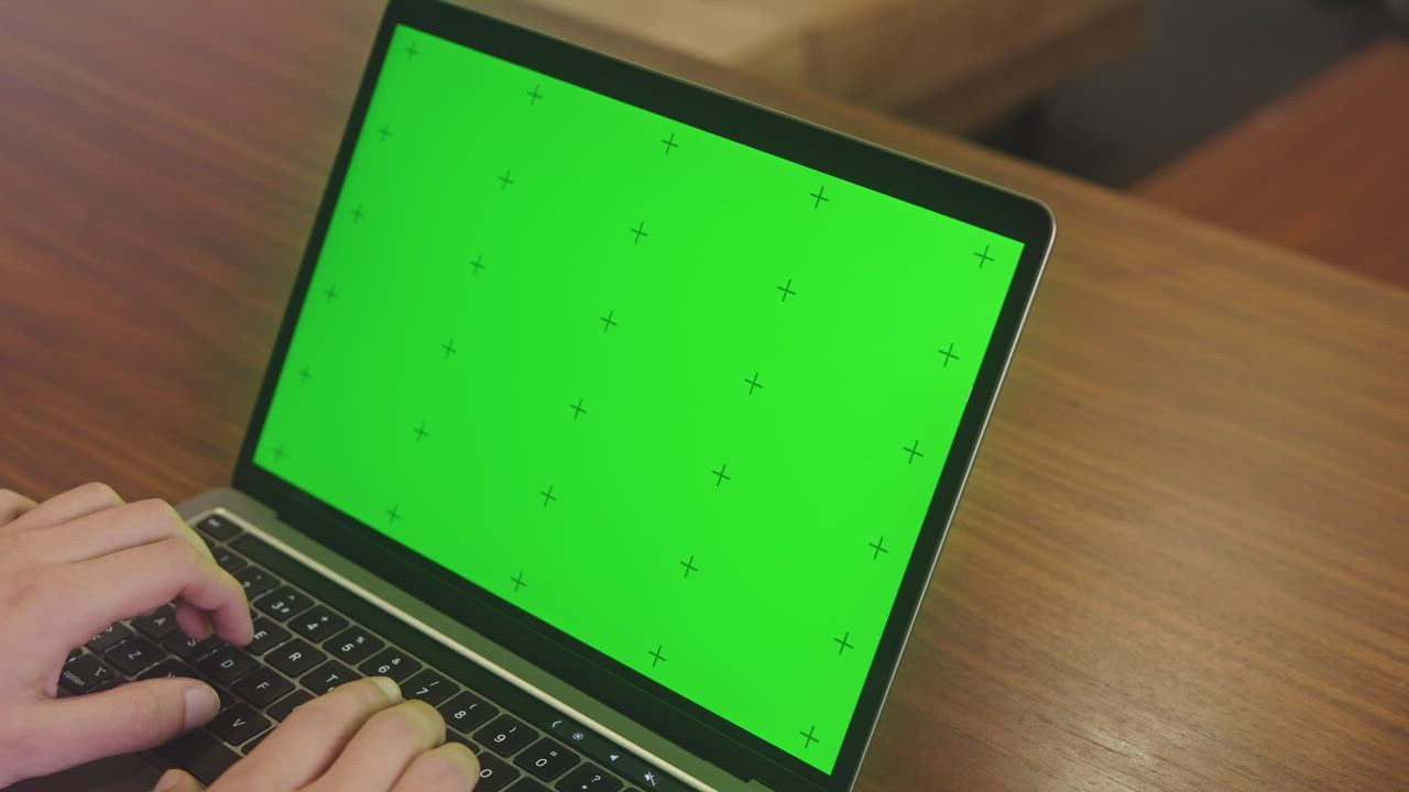 Close up of a green screen on a laptop - Free Stock Video