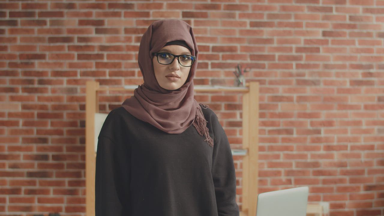 Young woman working in an office - Free Stock Video